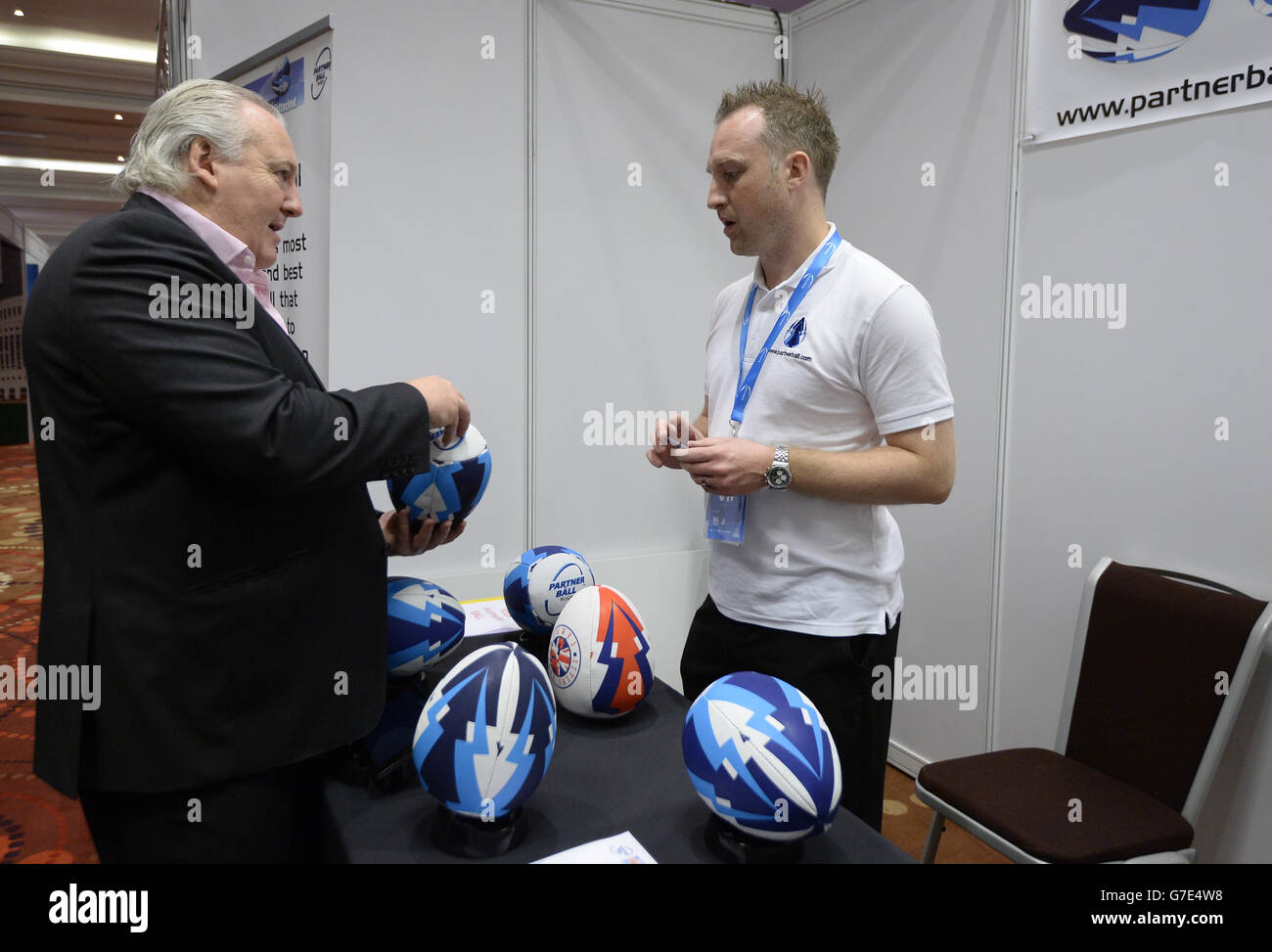 Delegates stand hi-res stock photography and images - Alamy