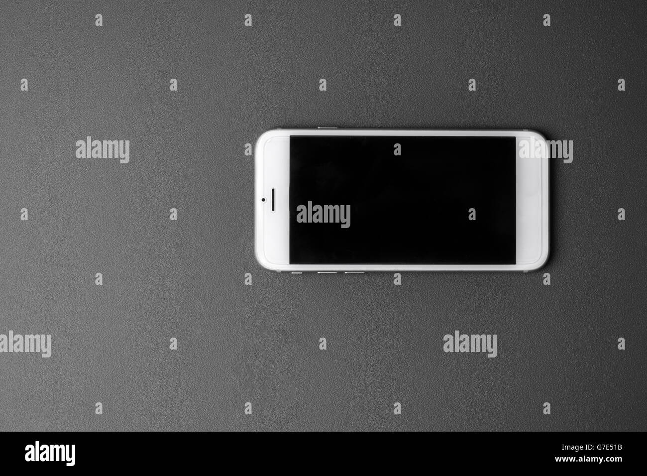 Blank smart phone on grey background Stock Photo - Alamy