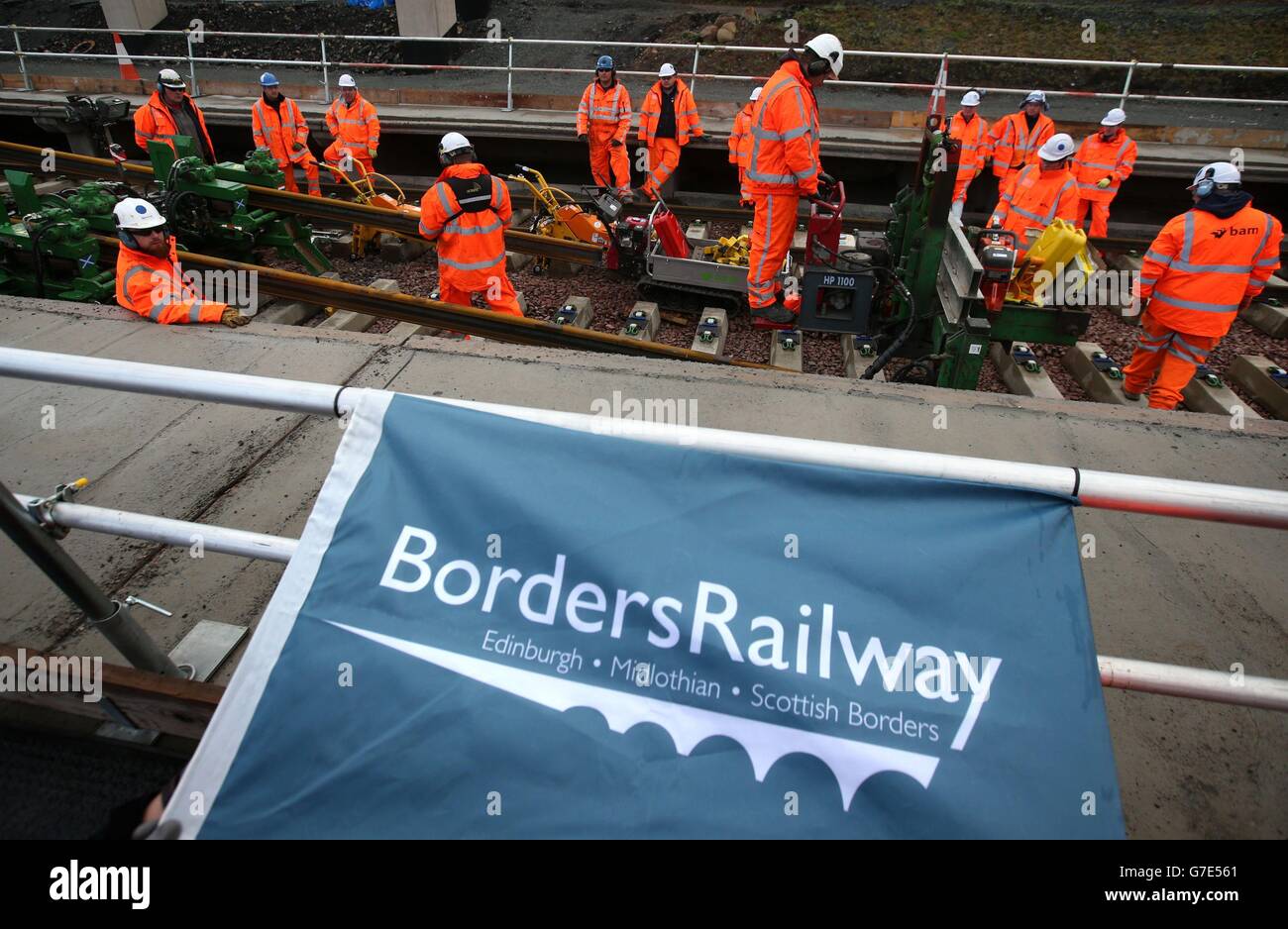 Using a new state of the art rail installation machine hi-res stock ...