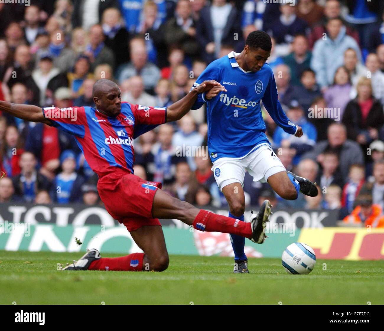 Birmingham's Julian Gray (R) is challenged by Crystal Palace's Emerson ...
