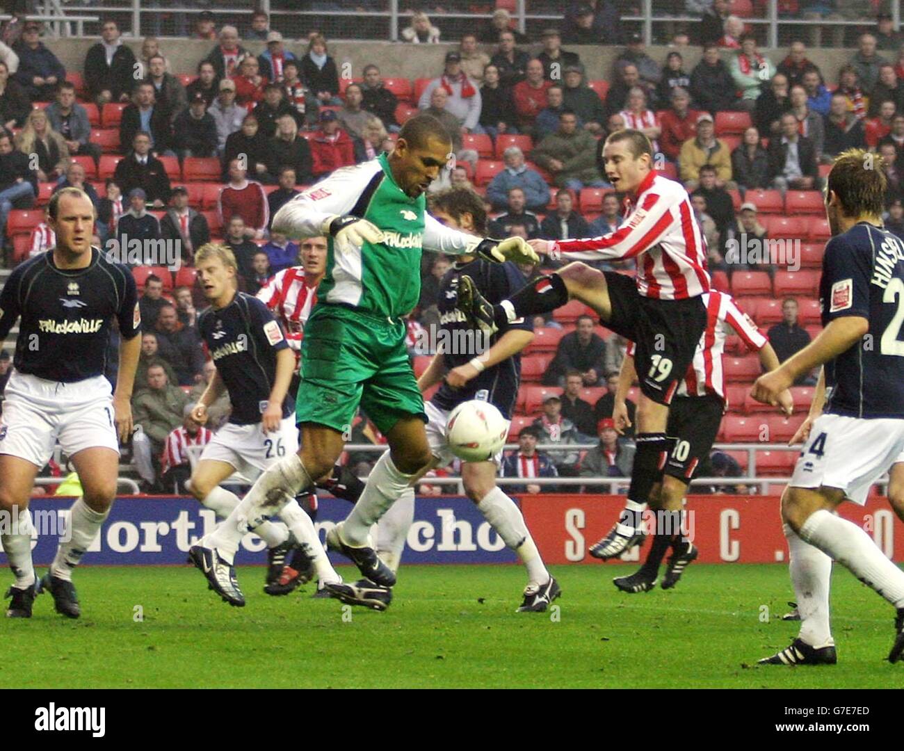 Brighton keeper Michael Kuipers blocks the ball from Sunderland forward ...