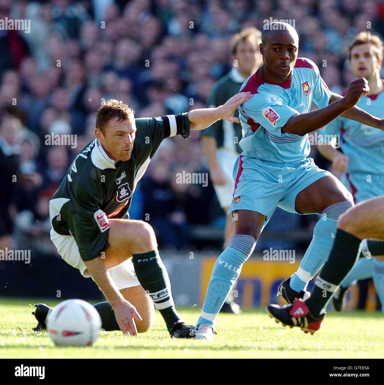 Plymouth's Graham Coughlin and West Ham United's Marlon Harewood in ...
