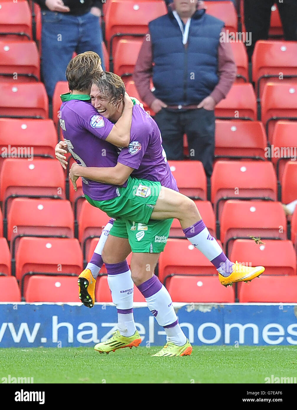 Bristol City's Luke Ayling is congratulated on scoring his team's first ...
