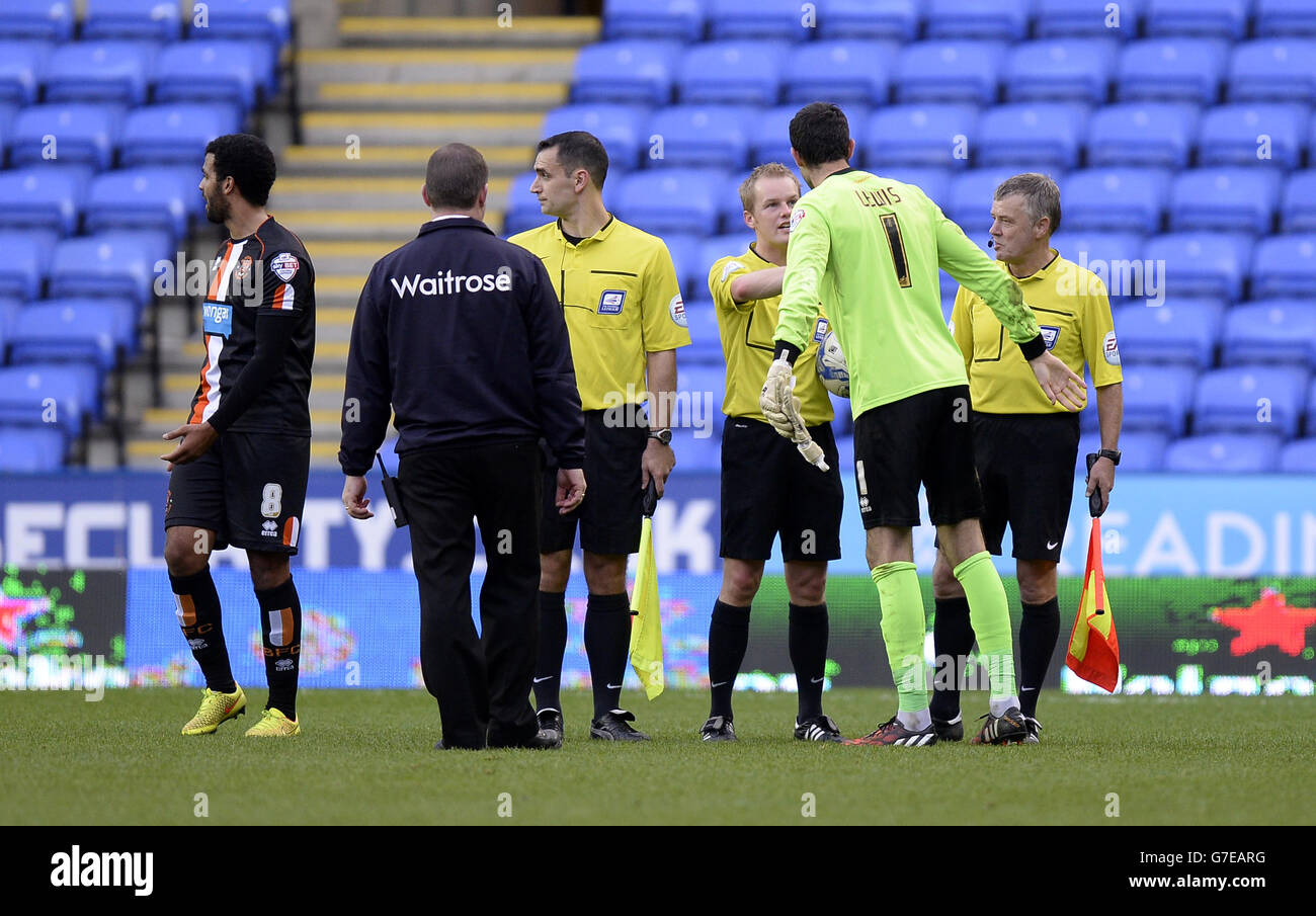 Blackpool goalkeeper Joe Lewis has words with referee Gavin Ward after ...