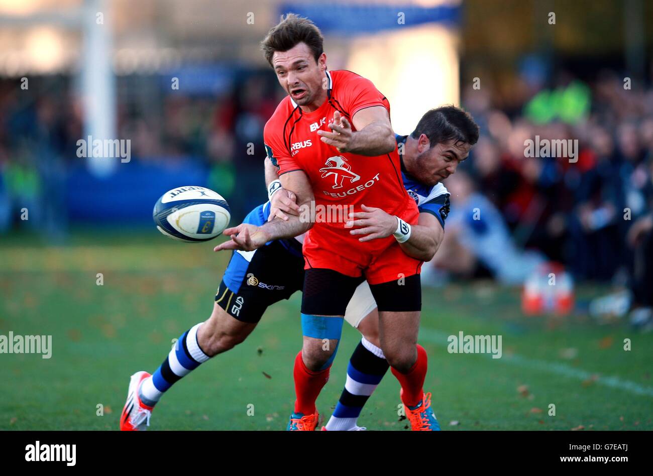 Toulouse's Vincent Clerc is tackled by Bath's Horacio Agulla during the ...