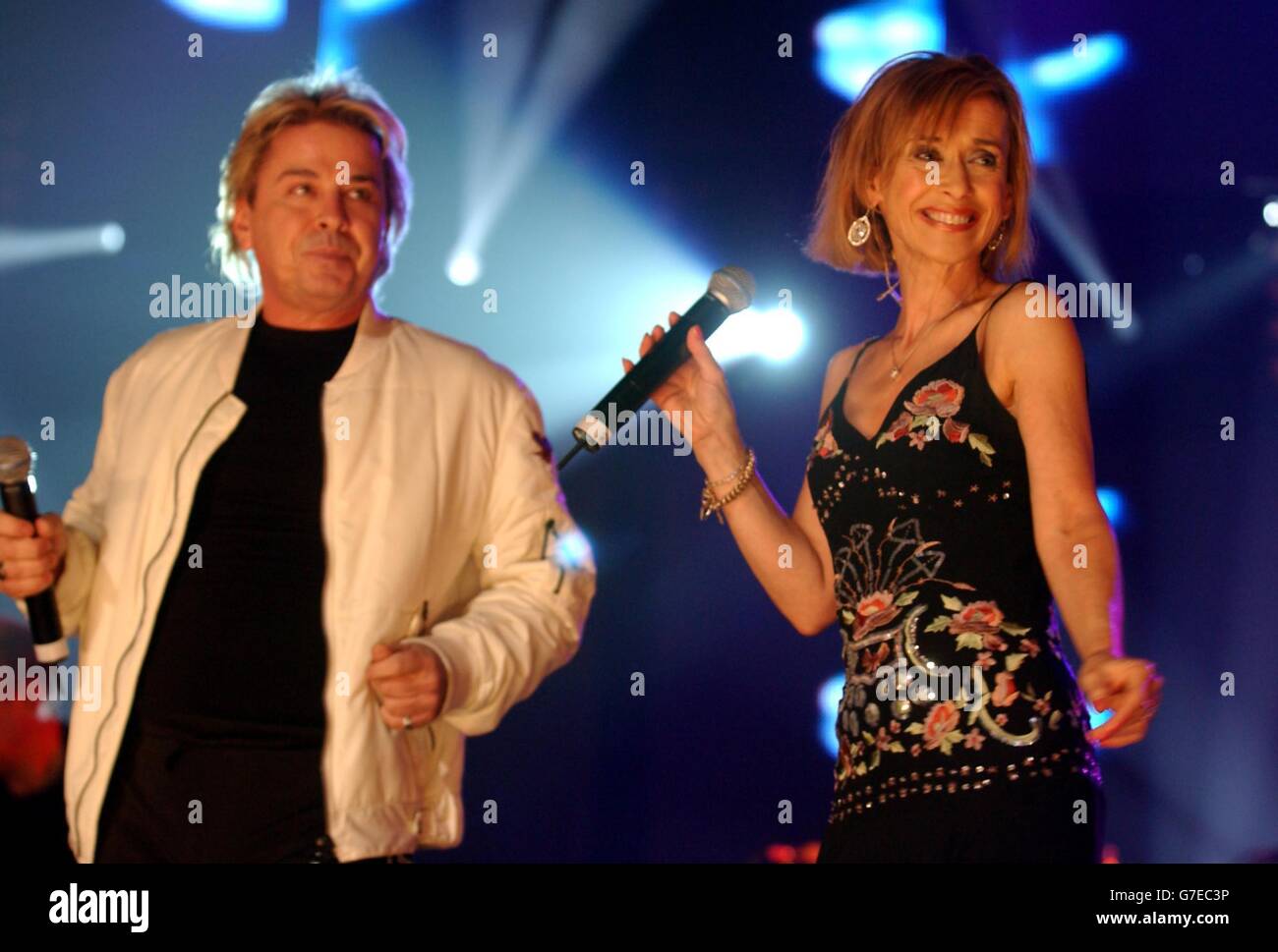 Thereza Bazar (R) and David Van Day of 1980's group Dollar, perform ...