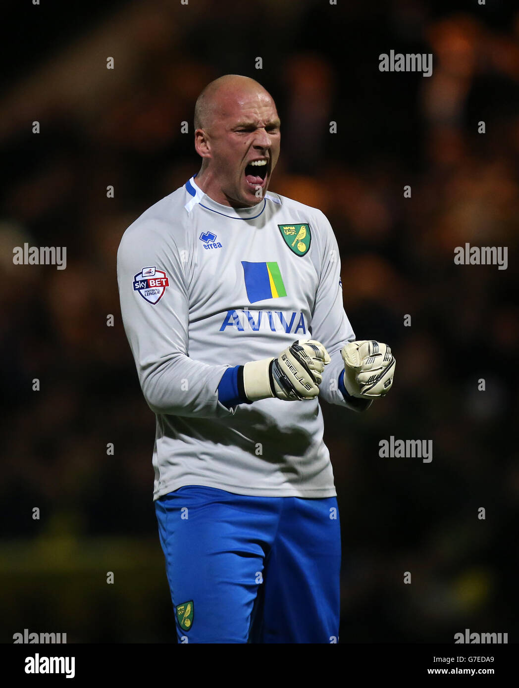 Norwich City's goalkeeper John Ruddy celebrates his teammate Cameron ...