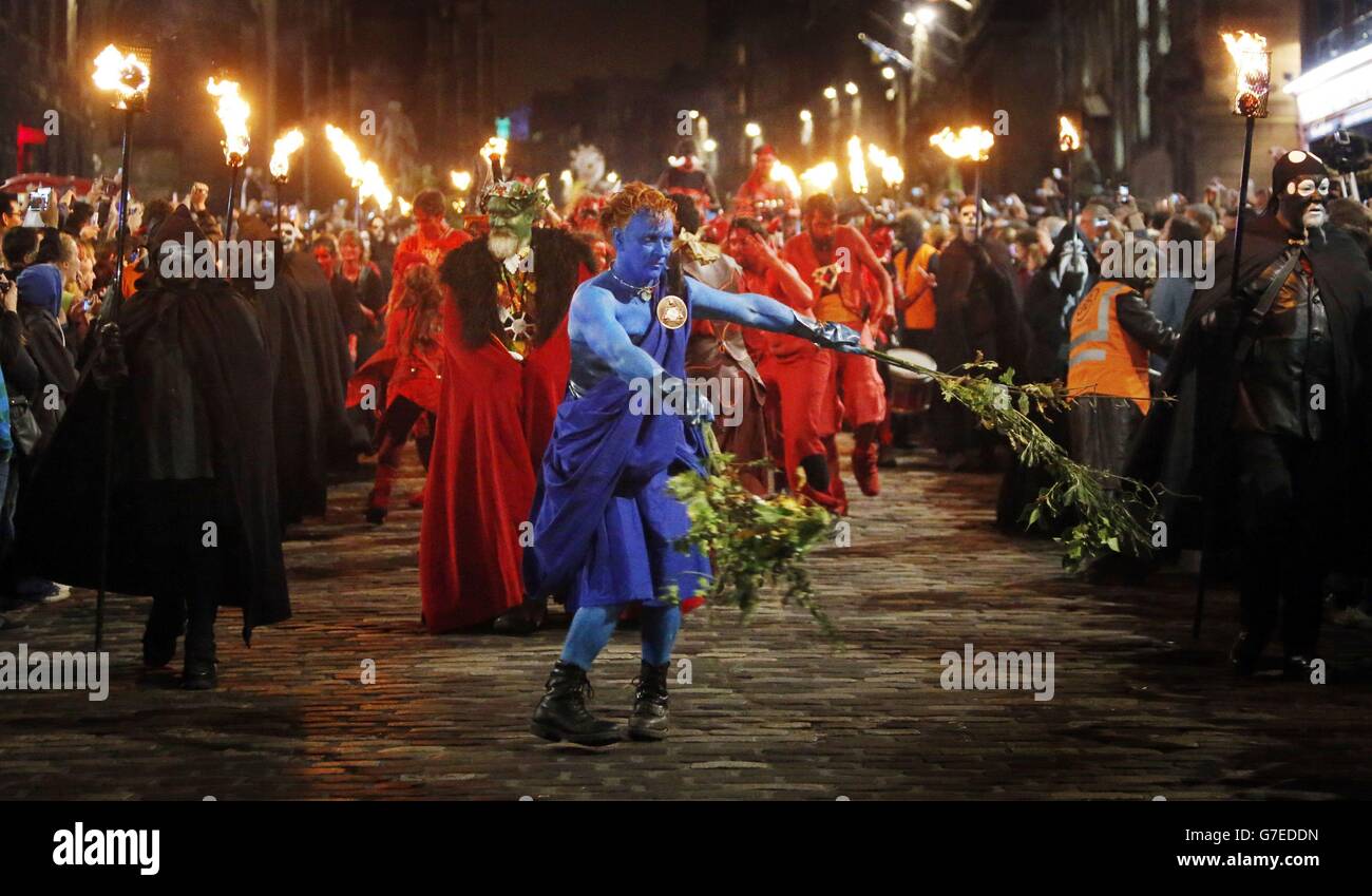 Members of the Beltane Fire Society take part in the Samhuinn Fire ...