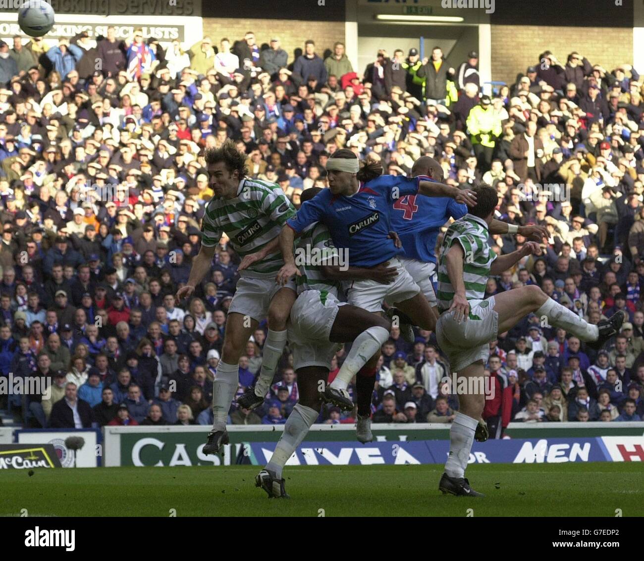 Rangers' Dado Prso (bandaged head) scores against Celtic during the ...