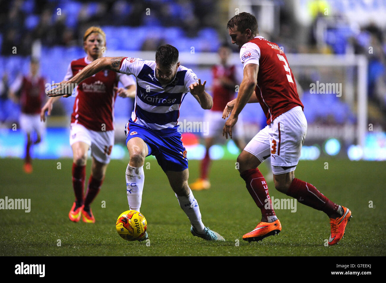 Reading's Jamie Mackie (left) and Rotherham United's Joe Skarz battle ...