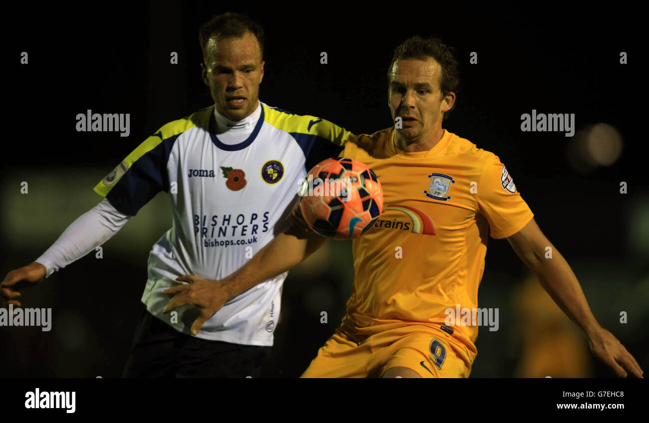 Havant & Waterlooville's Brian Dutton gives chase to Preston North end ...