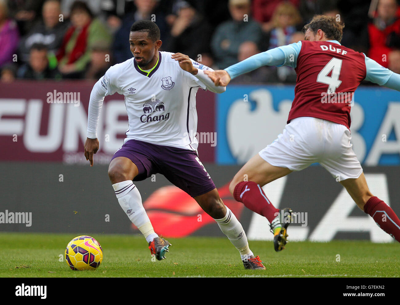 Everton's Samuel Eto'o (left) and Burnley's Michael Duff in action ...