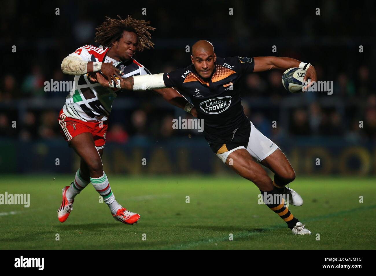 Wasps Tom Varndell is tackled by Harlequins Marland Yarde during the ...