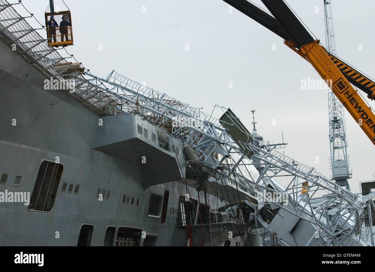 The arm of a 210ft crane rests on the side of the Royal Navy Aircraft ...