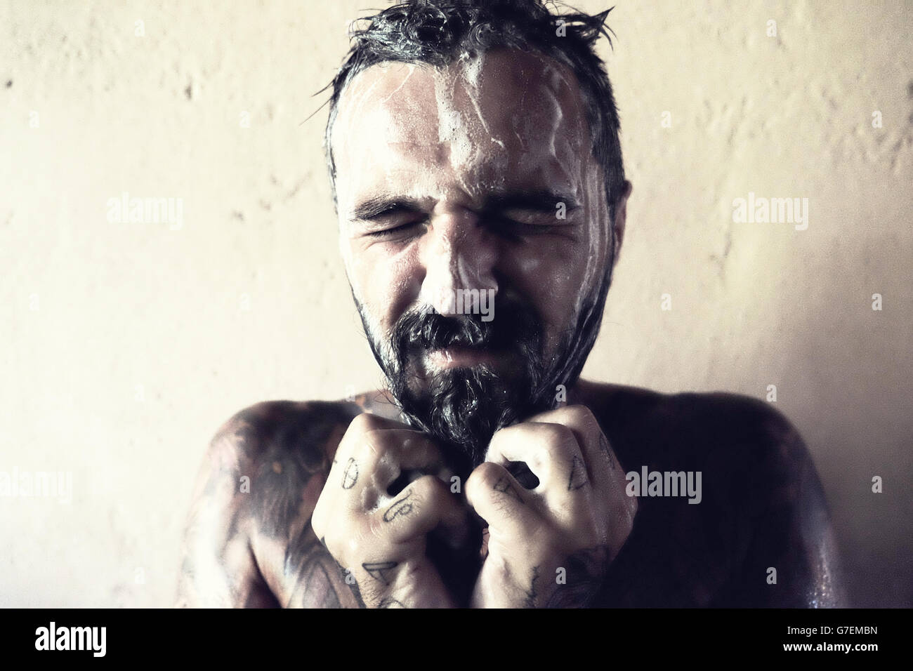 Man washing his face Stock Photo - Alamy