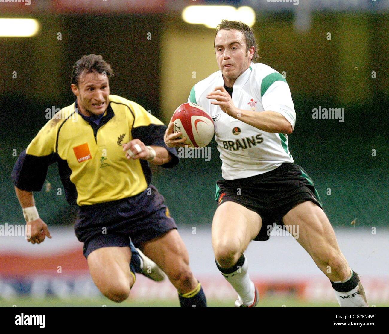 Wales' Rhys Williams (right) races through to score against Romania ...