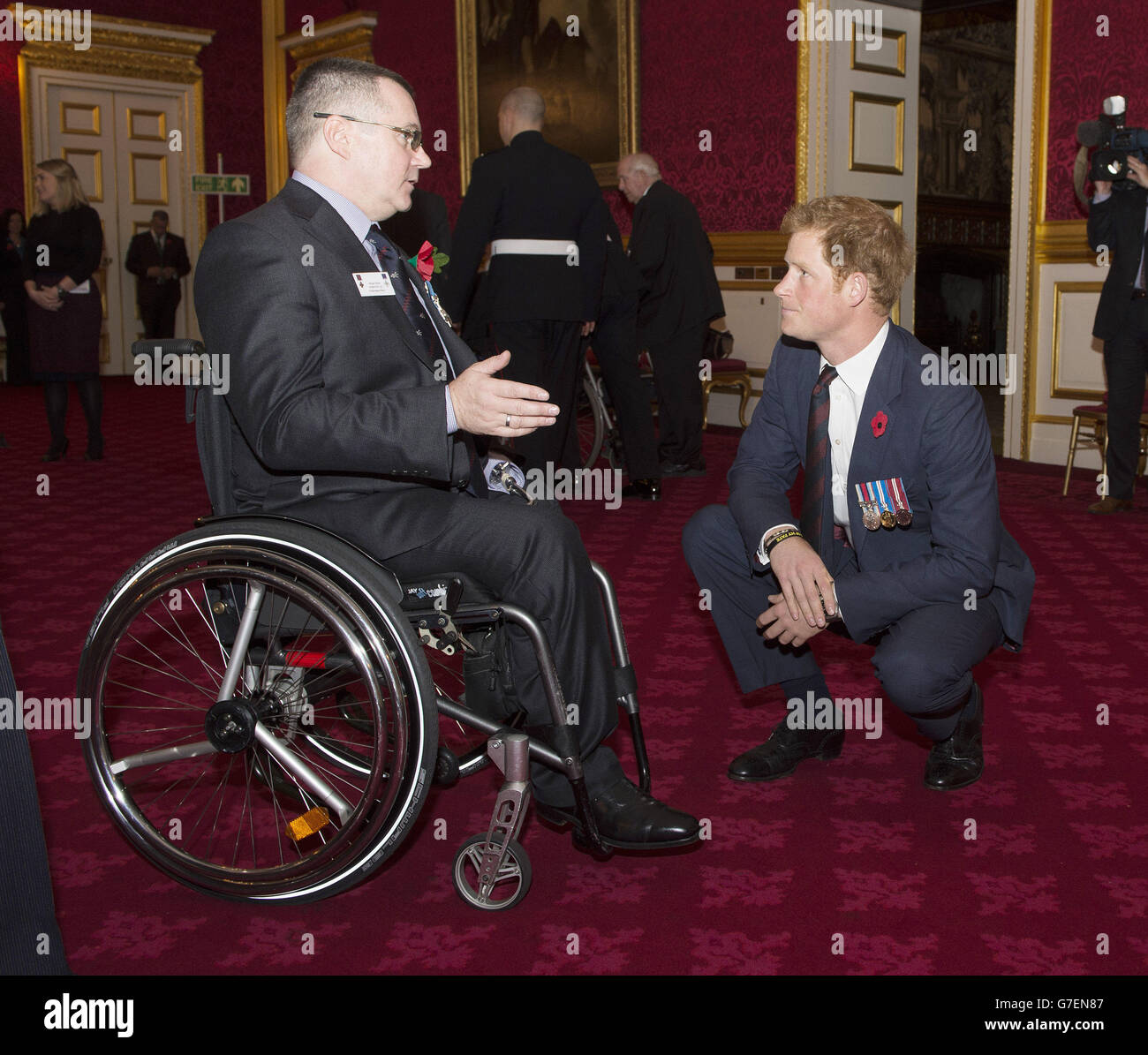 Prince Harry talks with Major Peter Norton GC as he arrives to host the ...