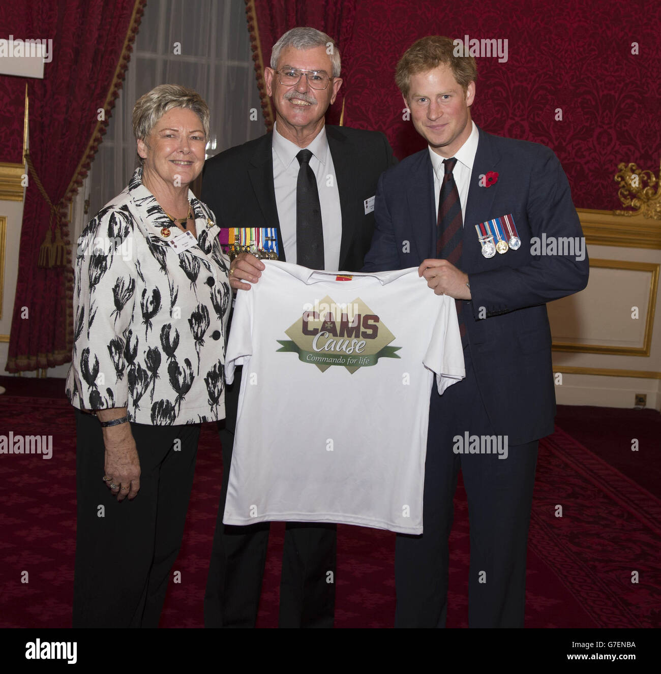 Kaye and Doug Baird, present Prince Harry with "Cams Cause" T-shirt, a ...