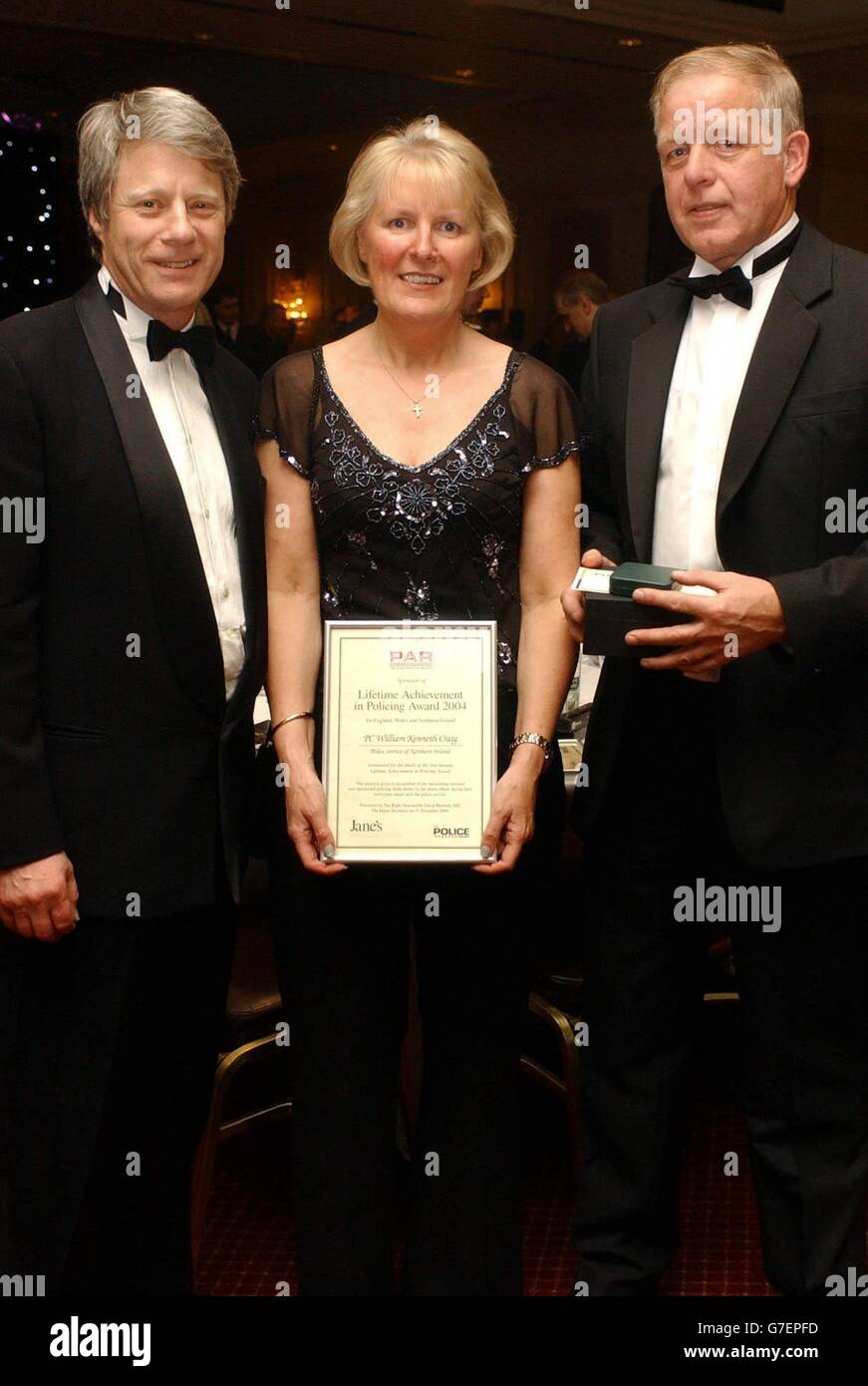 Ken Craig, winner of the Lifetime Achievement Award, stands with his ...