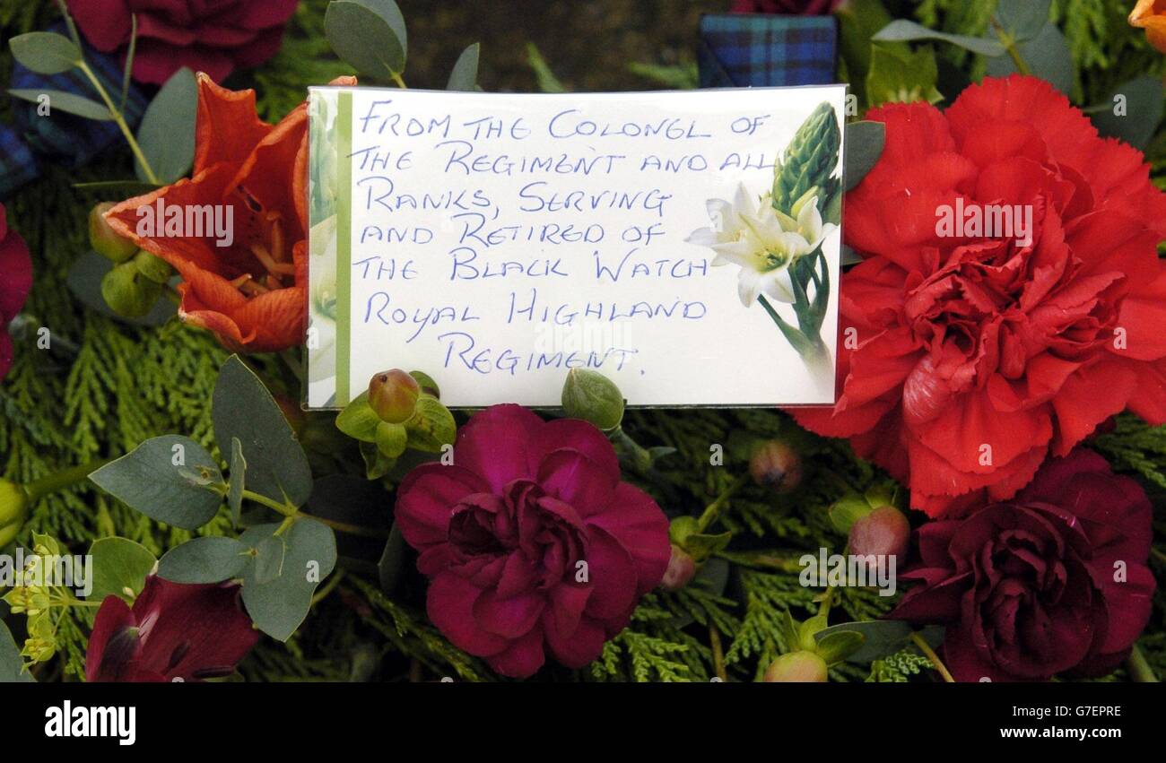 Pictured are flowers left at the funeral of Sgt Stuart Gray in ...