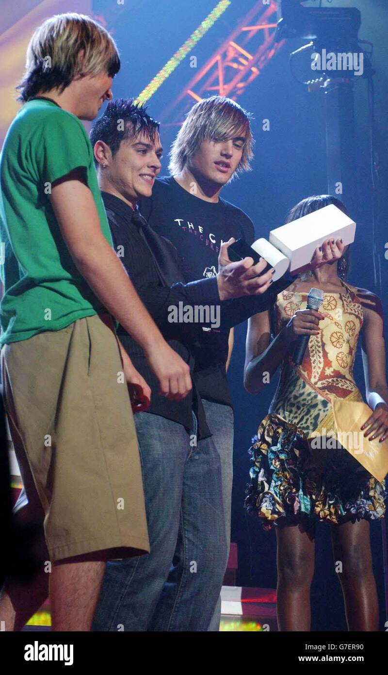 (L-R) James Bourne, Matt Willis and Charlie Simpson from Busted receive ...