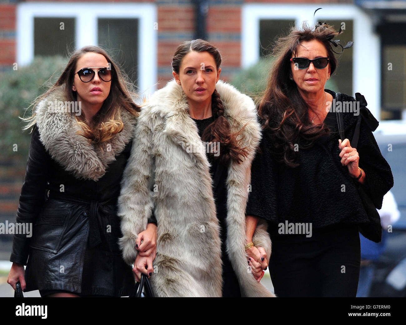 The widow of Jack Bruce, Margrit (right) arrives with her daughters ...