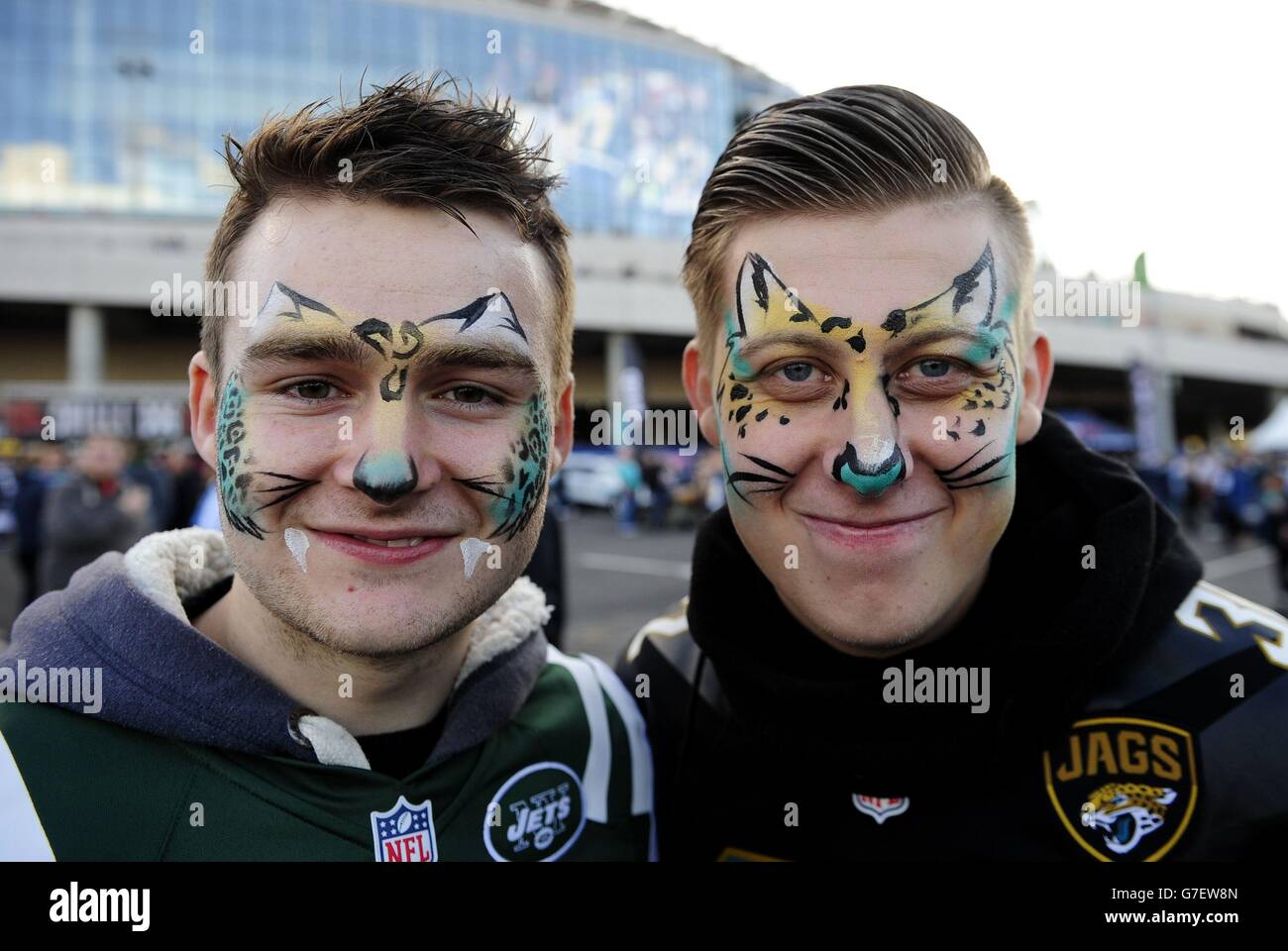 Two Jacksonville Jaguars fans show their support outside the stadium ...