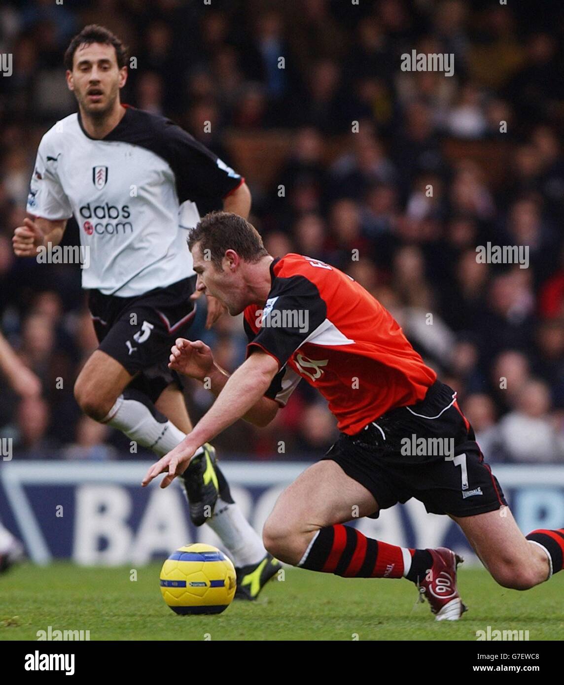 Football action fall bret emmerton syvain legwinski hi-res stock ...