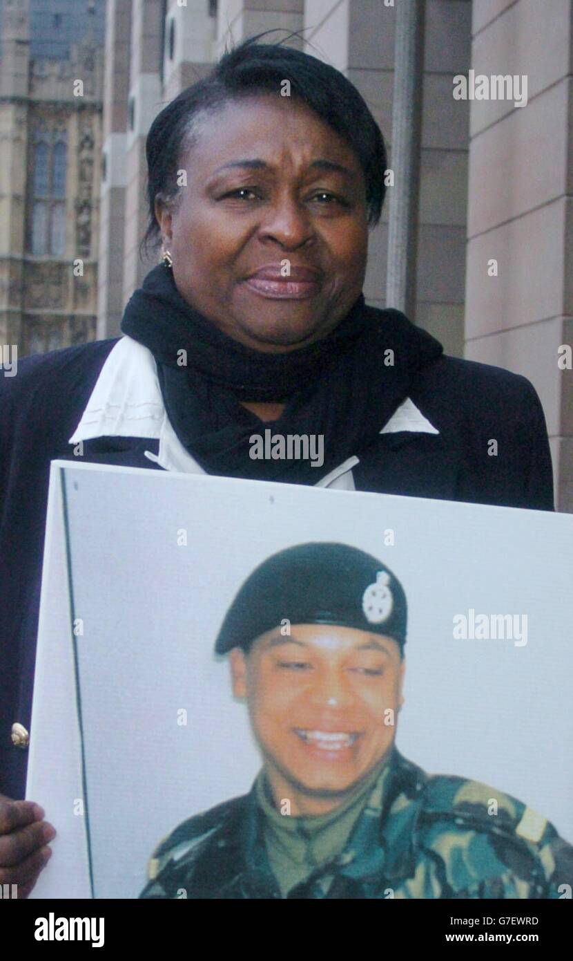 Claudia Beckley-Lines, the mother of William Beckley-Lines, holds a ...