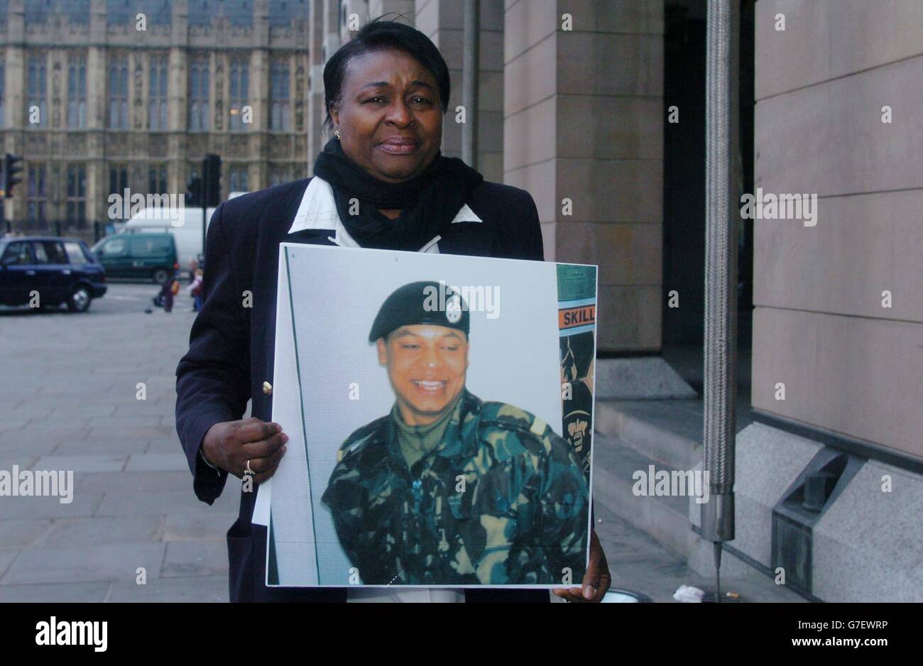 Claudia Beckley-Lines, the mother of William Beckley-Lines, holds a ...