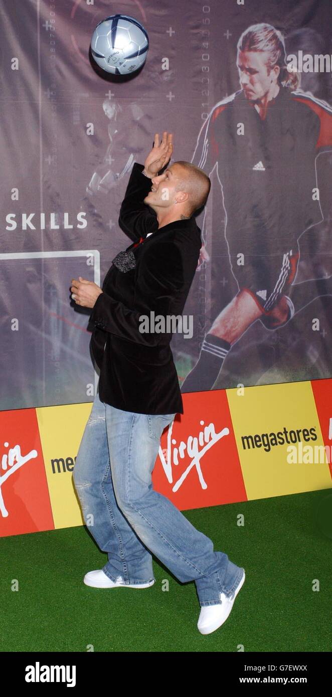 David Beckham shows off his football skills, during an in-store ...