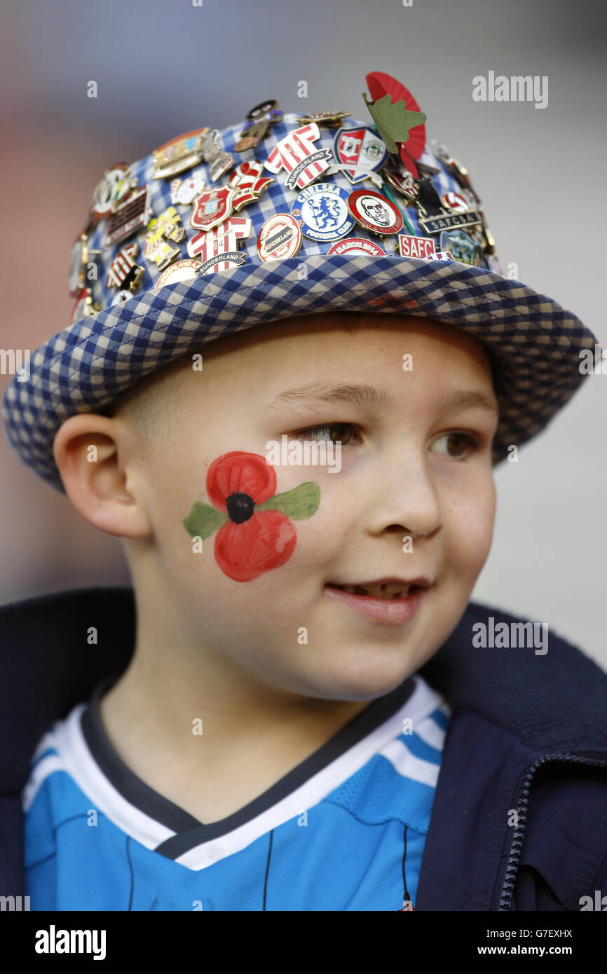 Football fan hat badge poppy poppies headshot head shot portrait hi-res ...