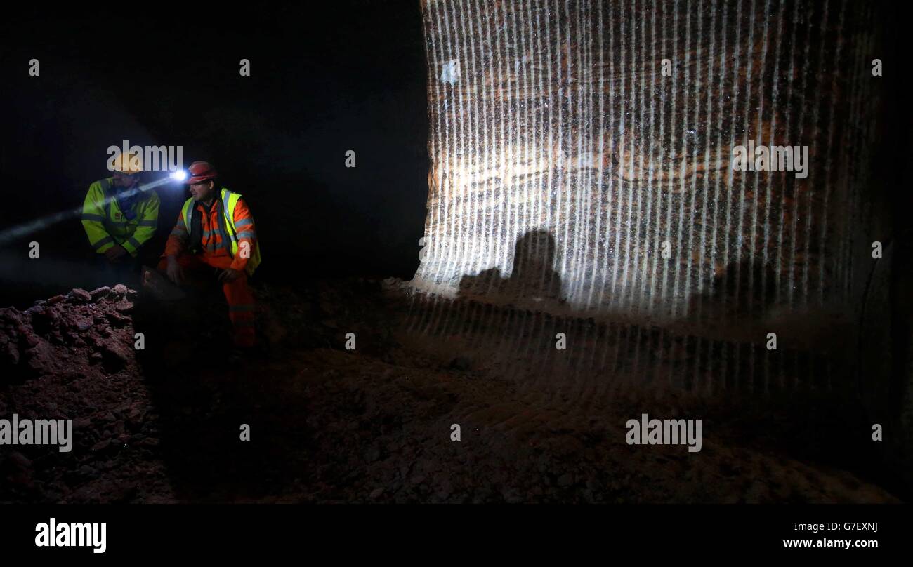 Miners work at the salt face, 500ft below the surface at the Compass ...
