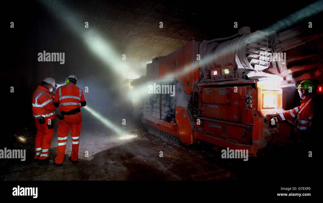 Miners work at the salt face, 500ft below the surface at the Compass ...
