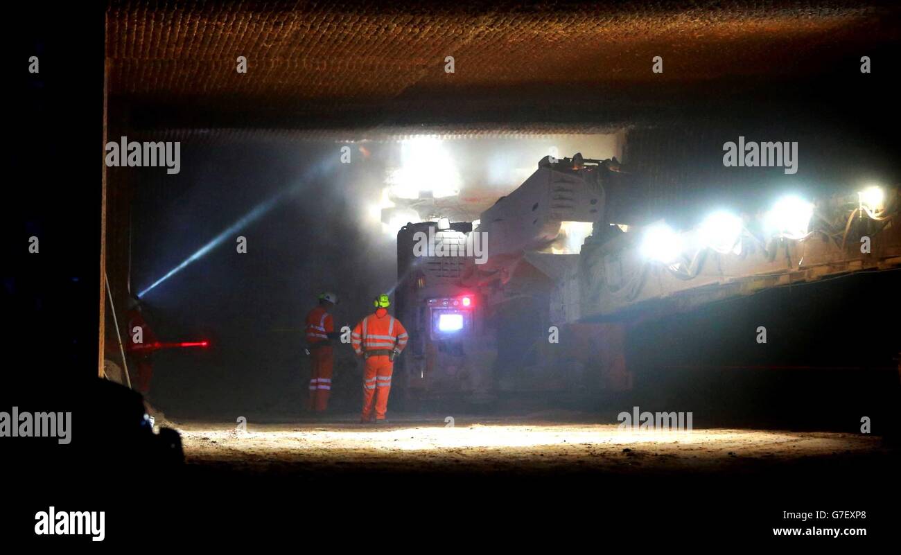 Miners work at the salt face, 500ft below the surface at the Compass ...