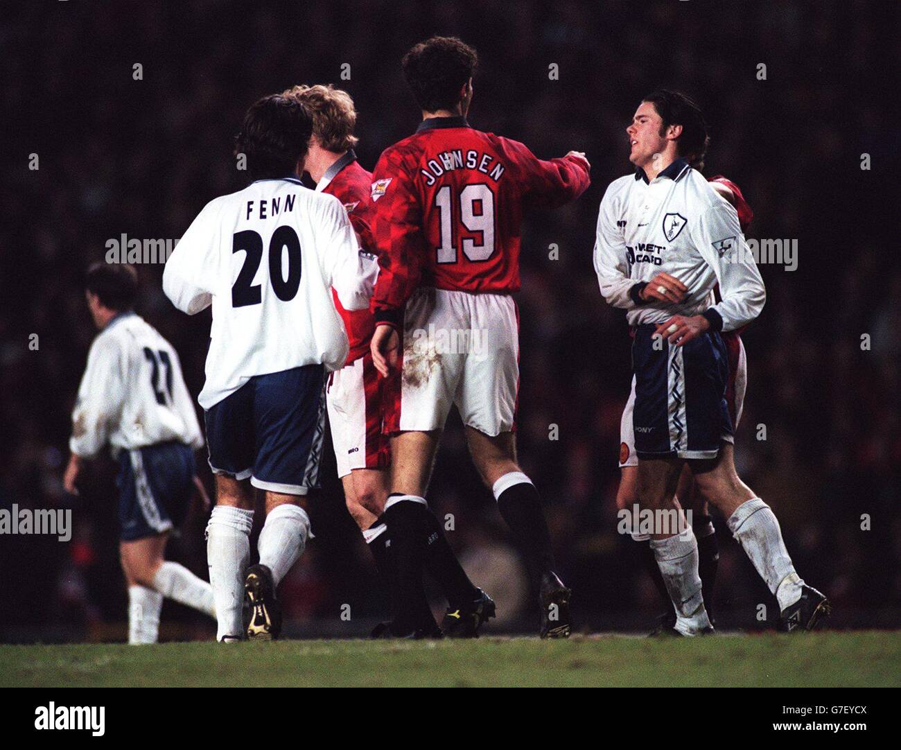 Ronny Johnsen of Manchester United scuffles with Rory Allen of ...