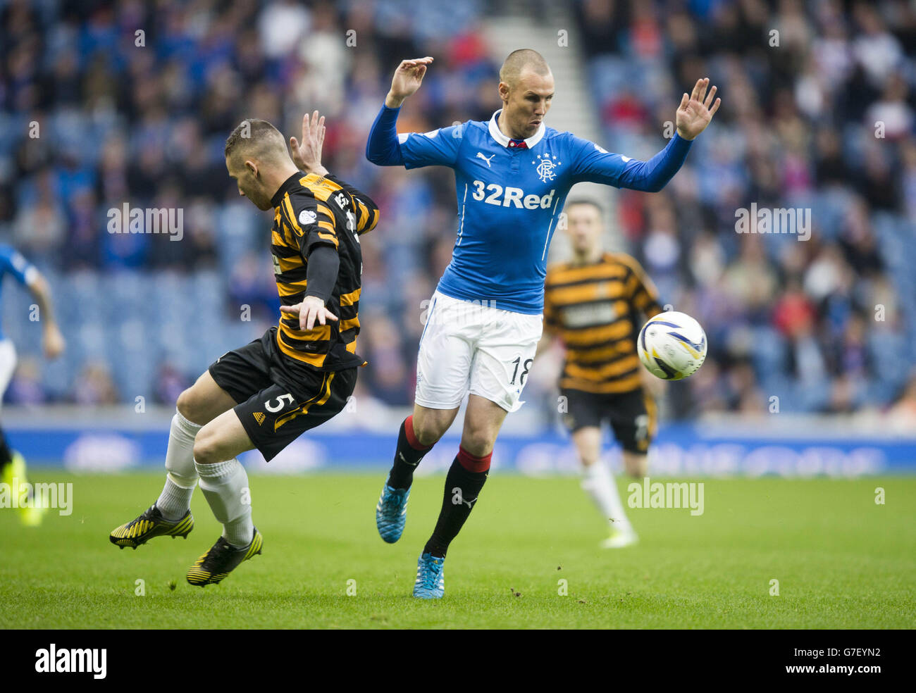 Rangers' Kenny Miller (right) and Alloa's Daryll Meggatt (left) battle ...