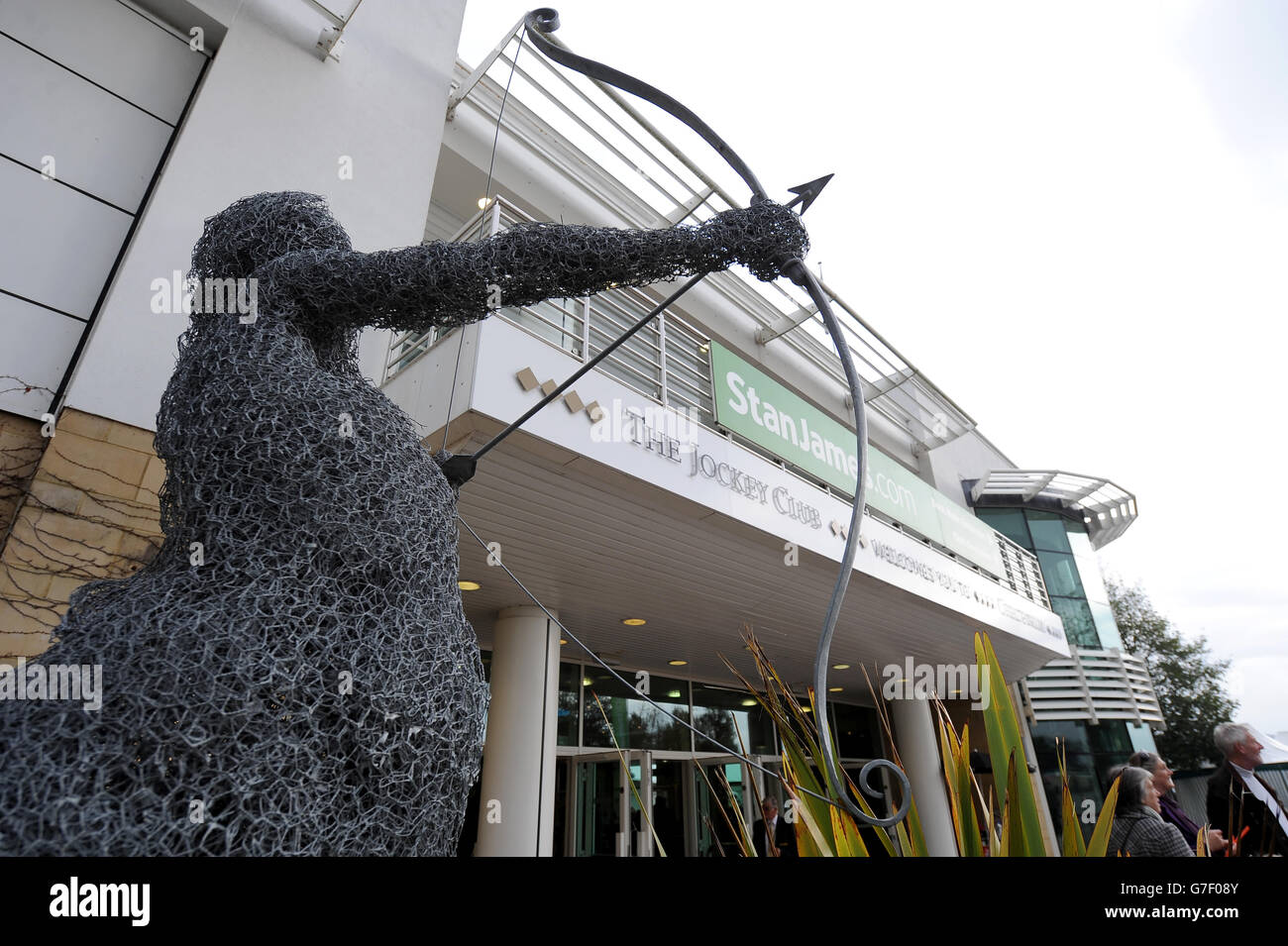 A general view of a Racegoers outside the entrance to Cheltenham ...