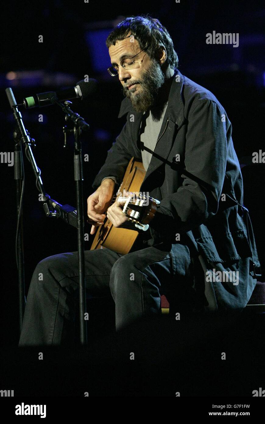 Cat Stevens performs on stage during a charity concert for Darfur at ...