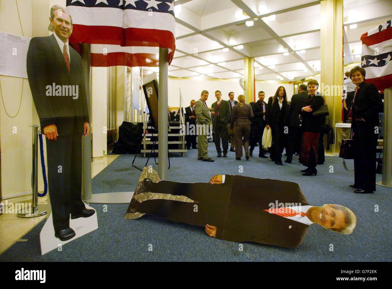 Cardboard cutouts of US presidential candidates George Bush and John ...