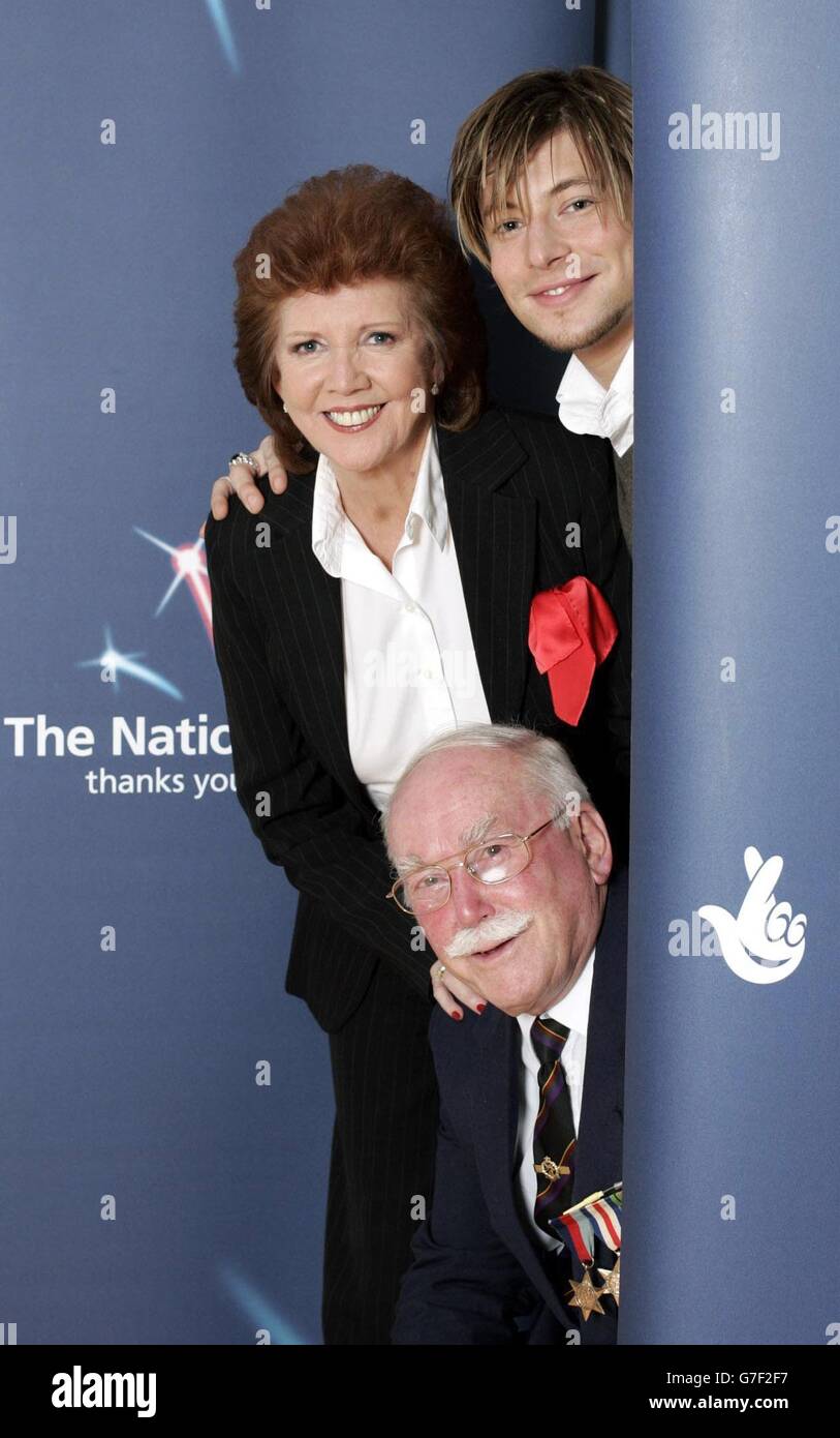 TV presenter Cilla Black and Blue singer Duncan James (top) pose with ...
