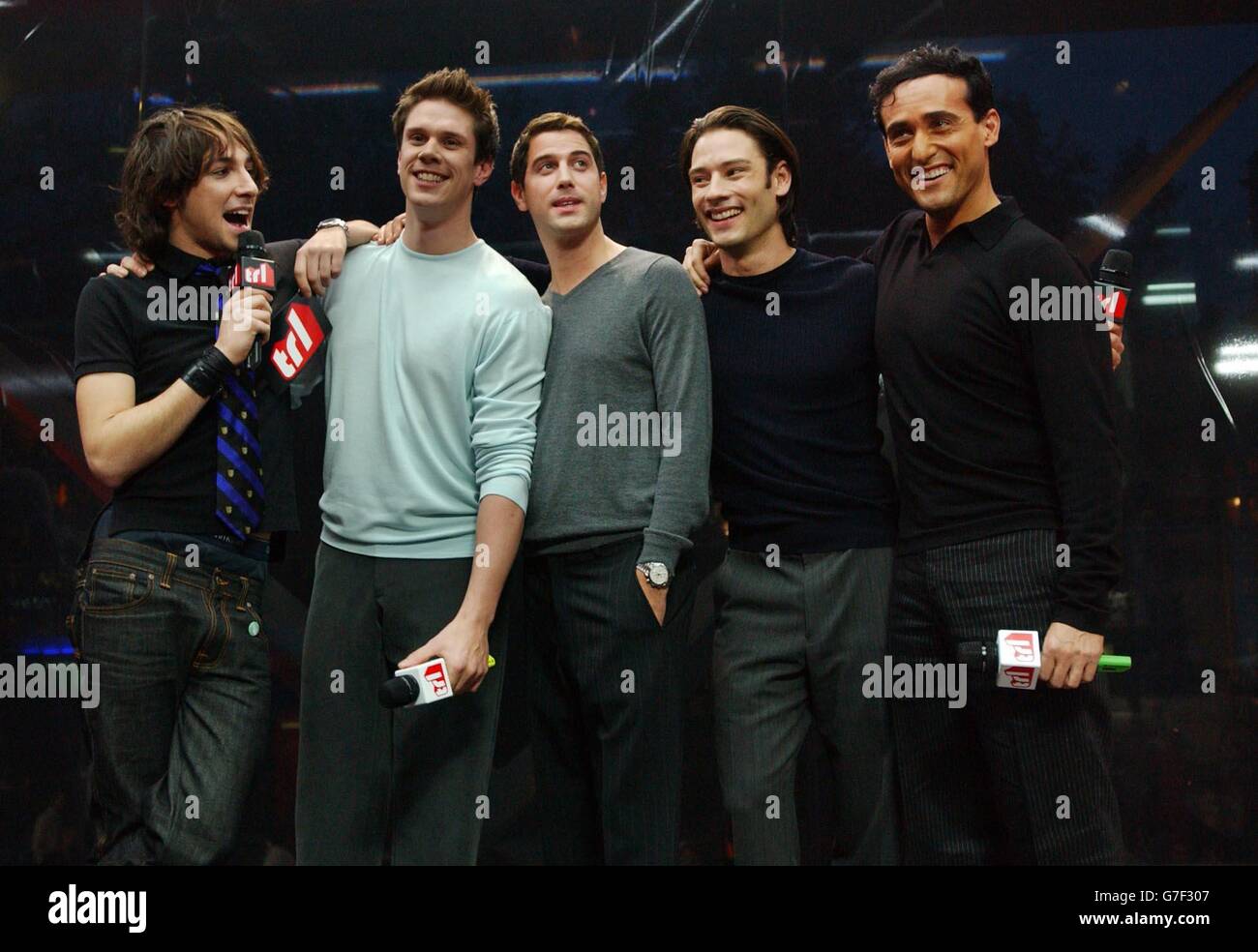 (From left to right)MTV presenter Alex Zane with David Miller ...