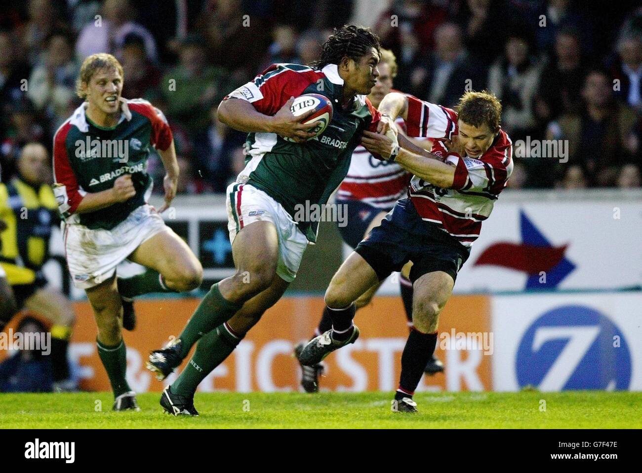 Leicester's Alesana Tuilagi hands off the tackle of Gloucester's Alex ...
