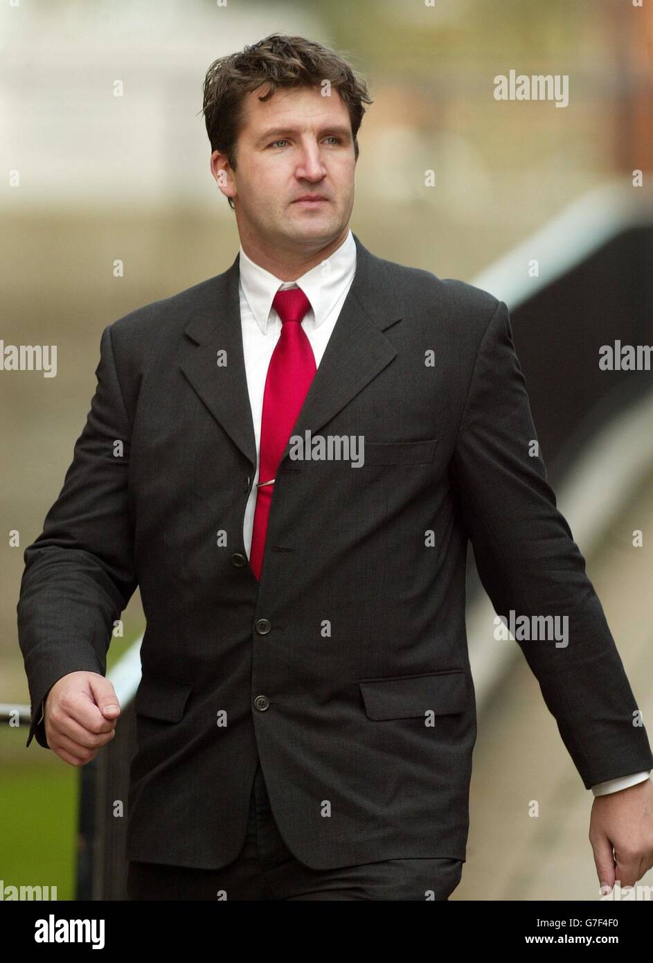Surrey Police officer Andrew Lang arrives at Winchester Crown Court ...