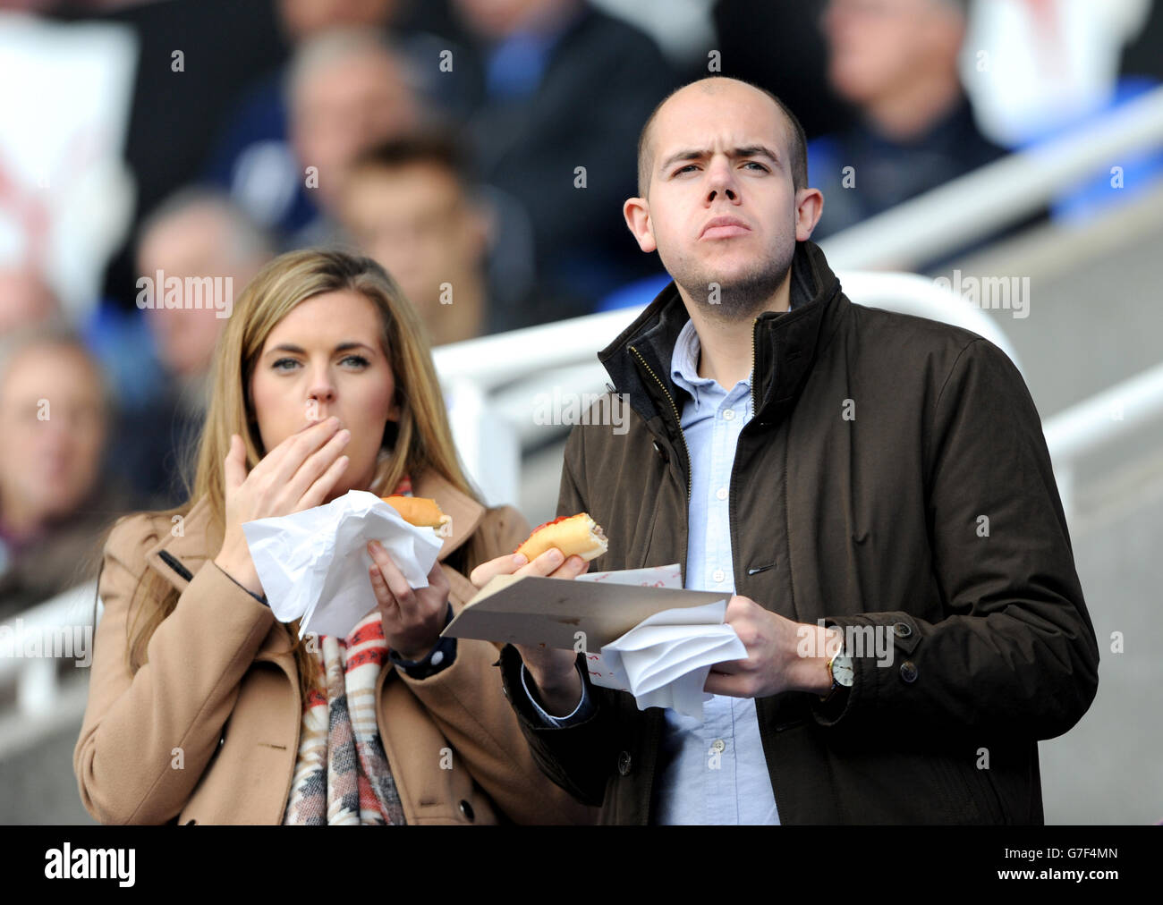 Fans eat food in the stands hi-res stock photography and images - Alamy
