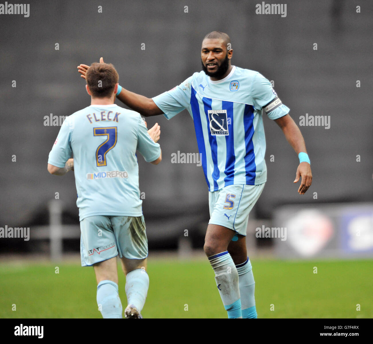 Coventry City's Captain Reda Johnson congratulates John Fleck on assist ...
