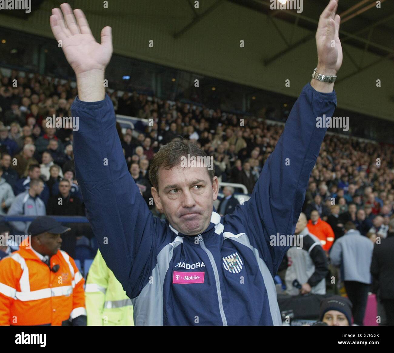 Bryan Robson, the new West Bromwich Albion manager waves to the crowd ...