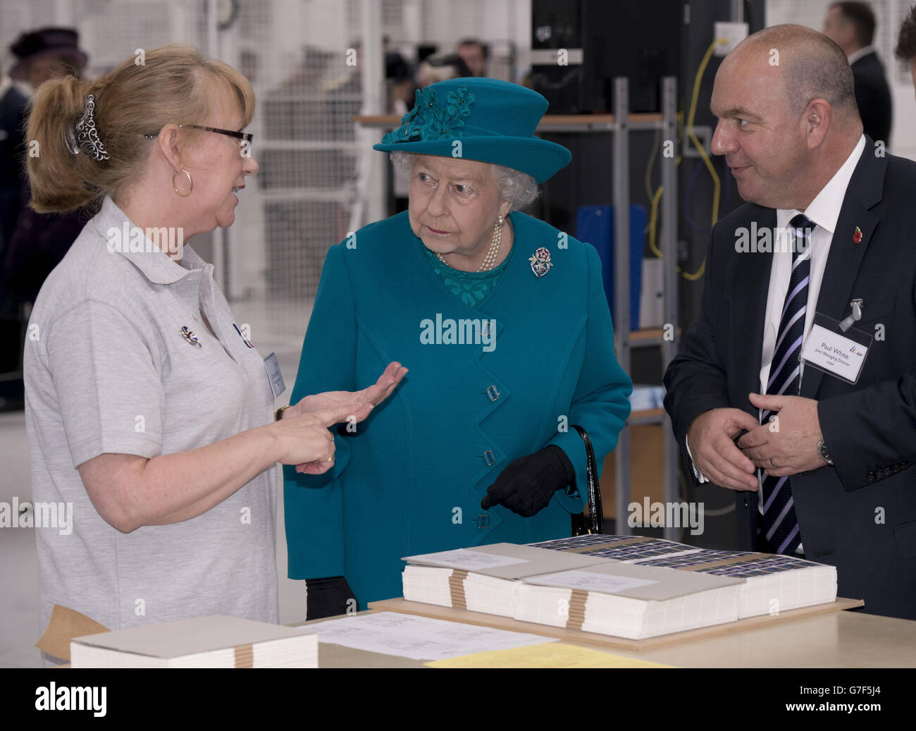 Queen Elizabeth II checks the quality control process with MD Paul ...