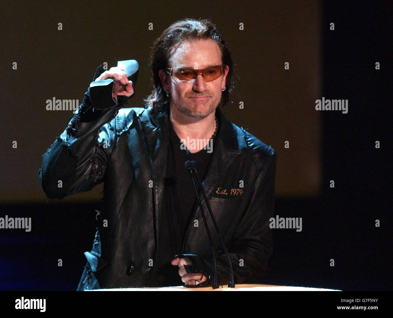 U2 frontman Bono accepts the Founding Member of the Music Hall of Fame ...