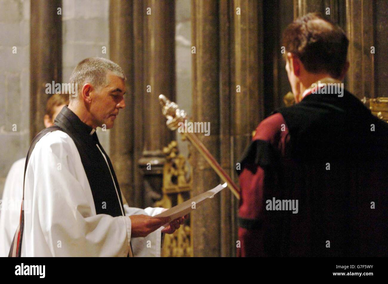 The Venerable David Pierpoint reads a declaration before being ...